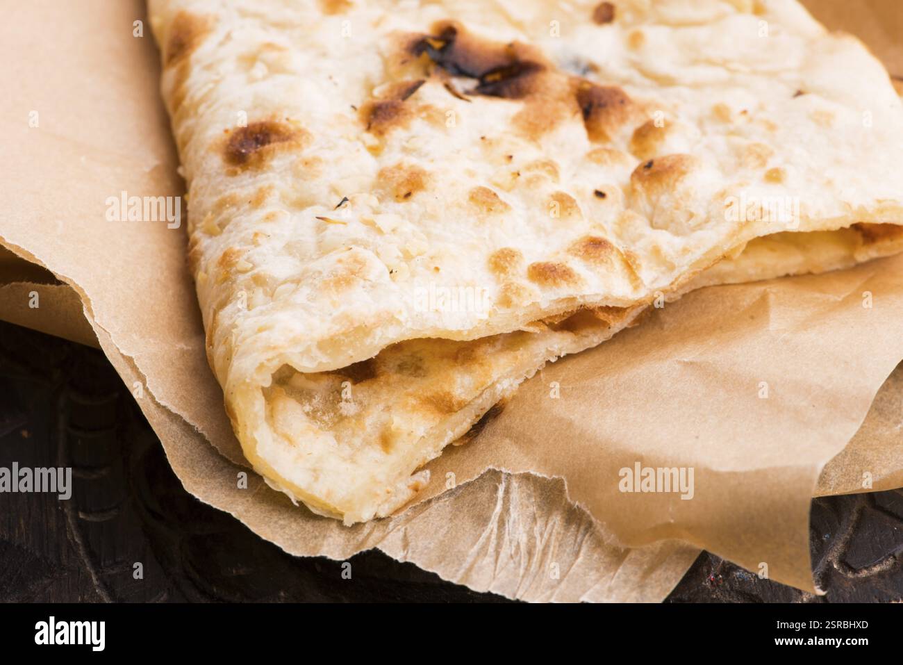 Garlic Naan, Indian flat bread Stock Photo - Alamy