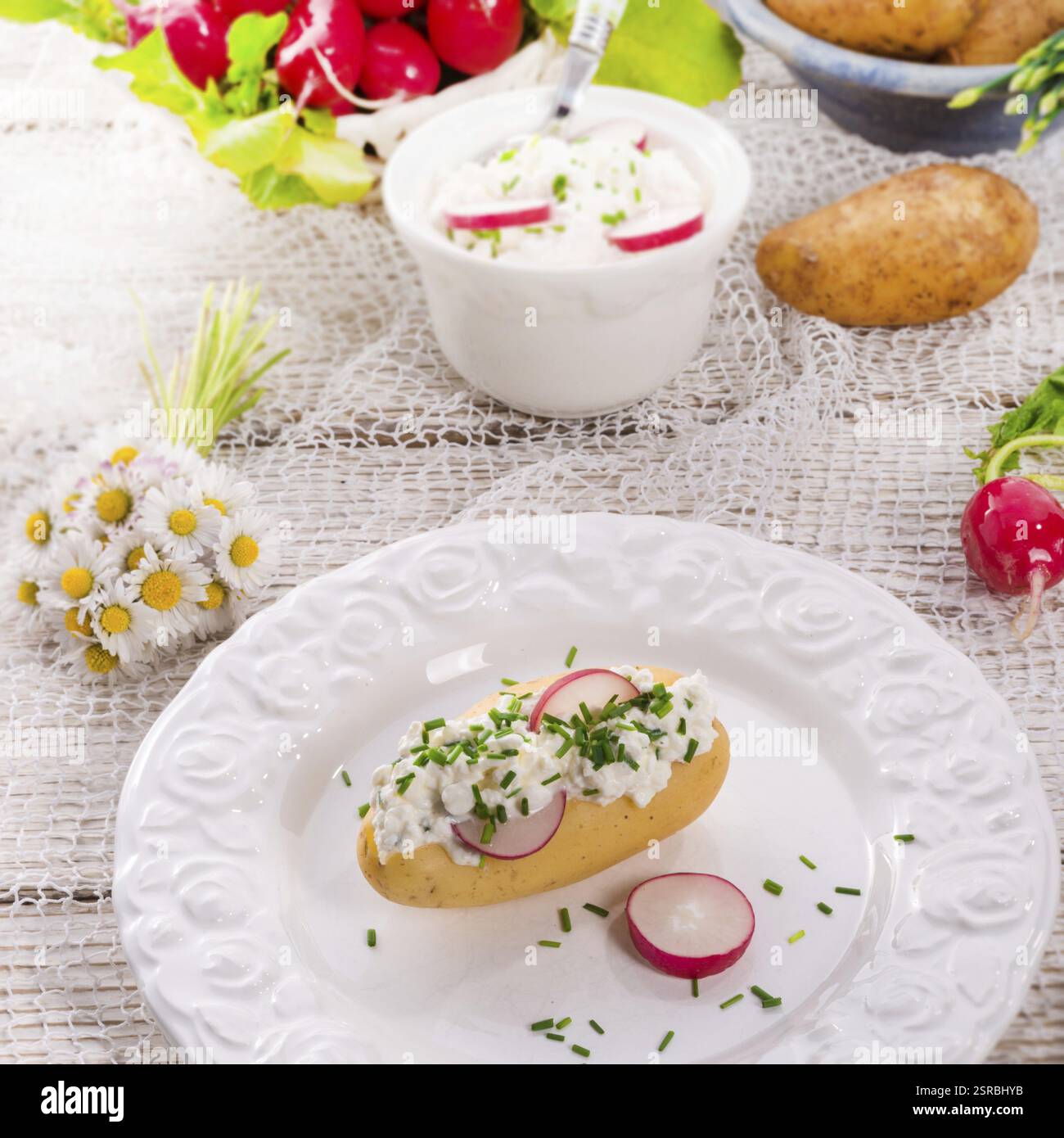 New potatoes with spring curd Stock Photo - Alamy
