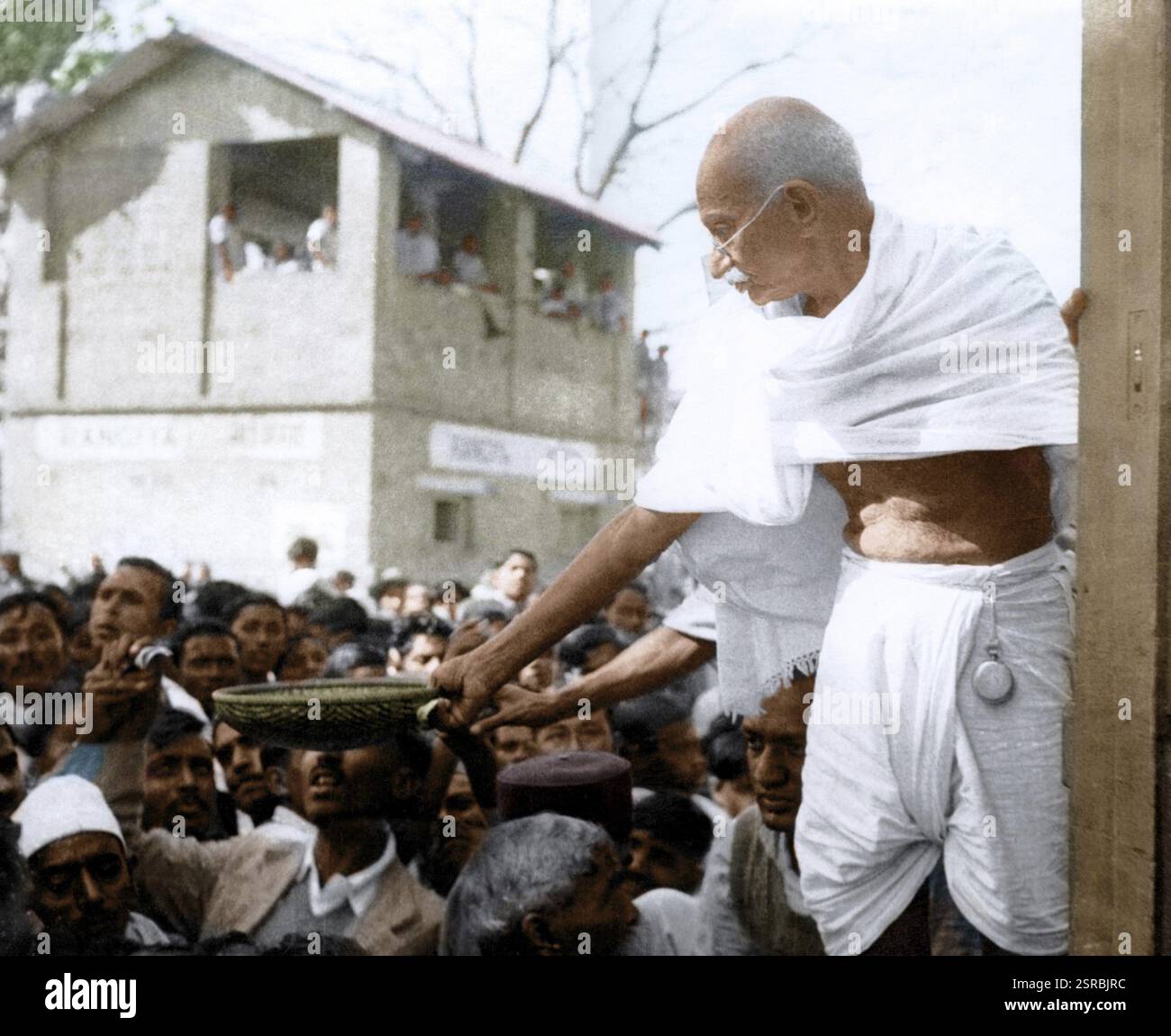 Mahatma Gandhi collecting donations on platform for Harijan Fund, India ...