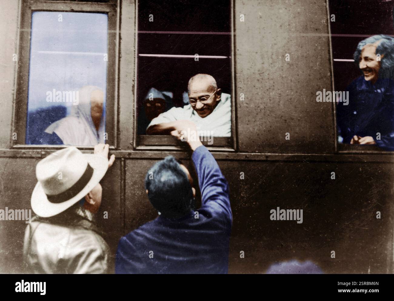 Mahatma Gandhi greeting people from train, way to Switzerland, France ...