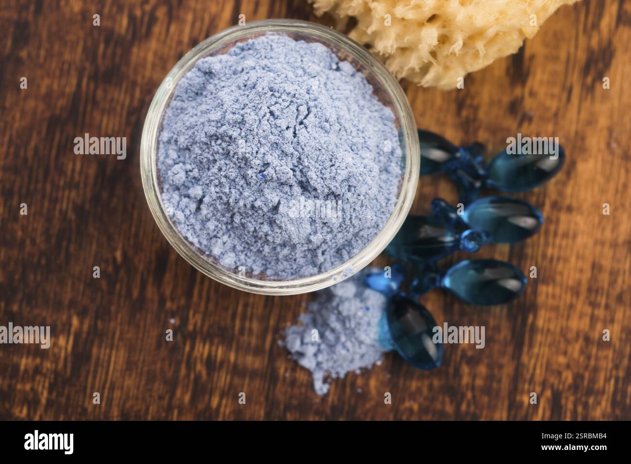 Blue clay mask with serum capsules Stock Photo - Alamy