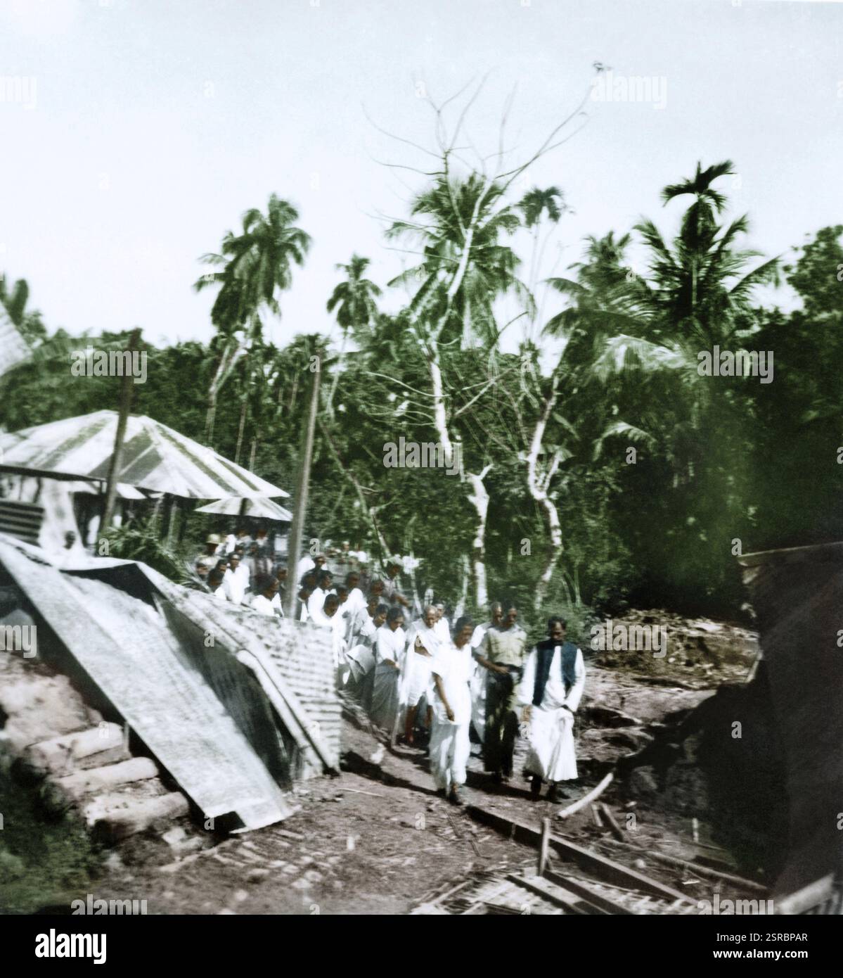 Mahatma Gandhi visiting village after Hindu Muslim riots, East Bengal ...
