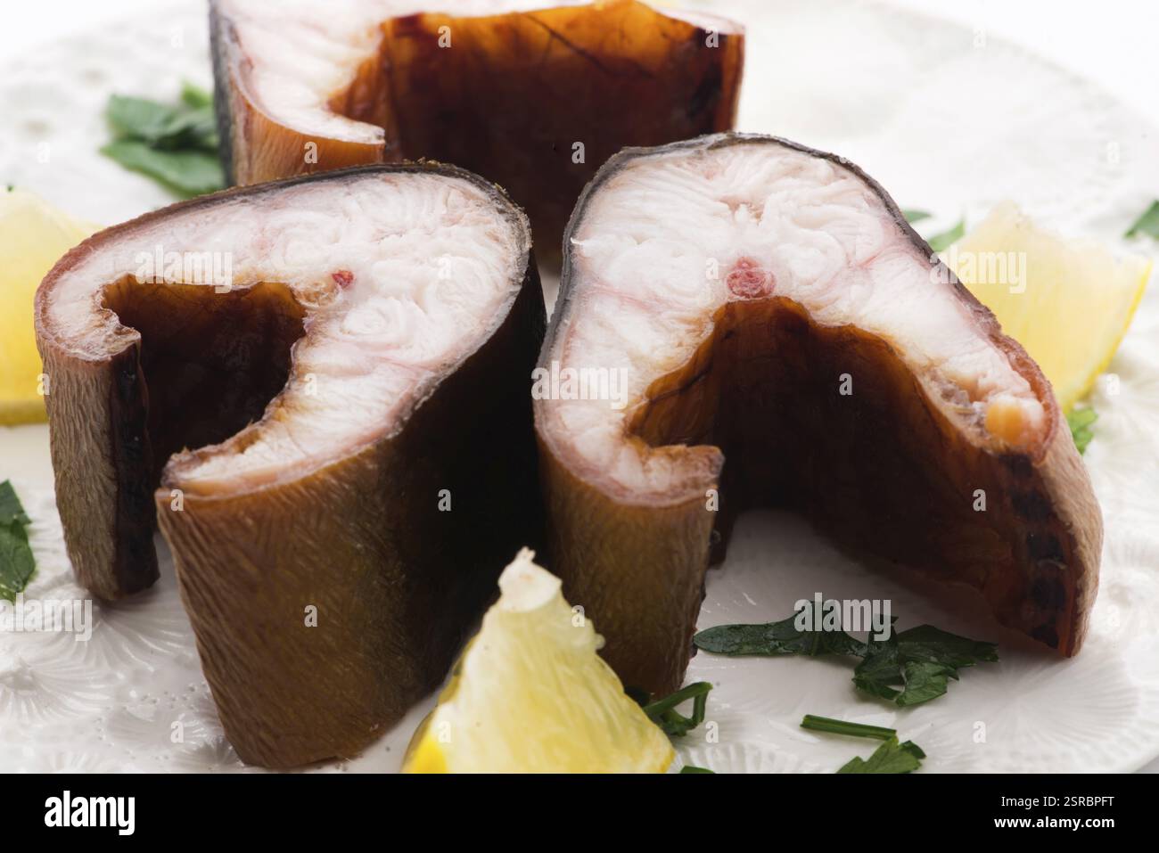 Freh smoked eel as appetizer Stock Photo - Alamy