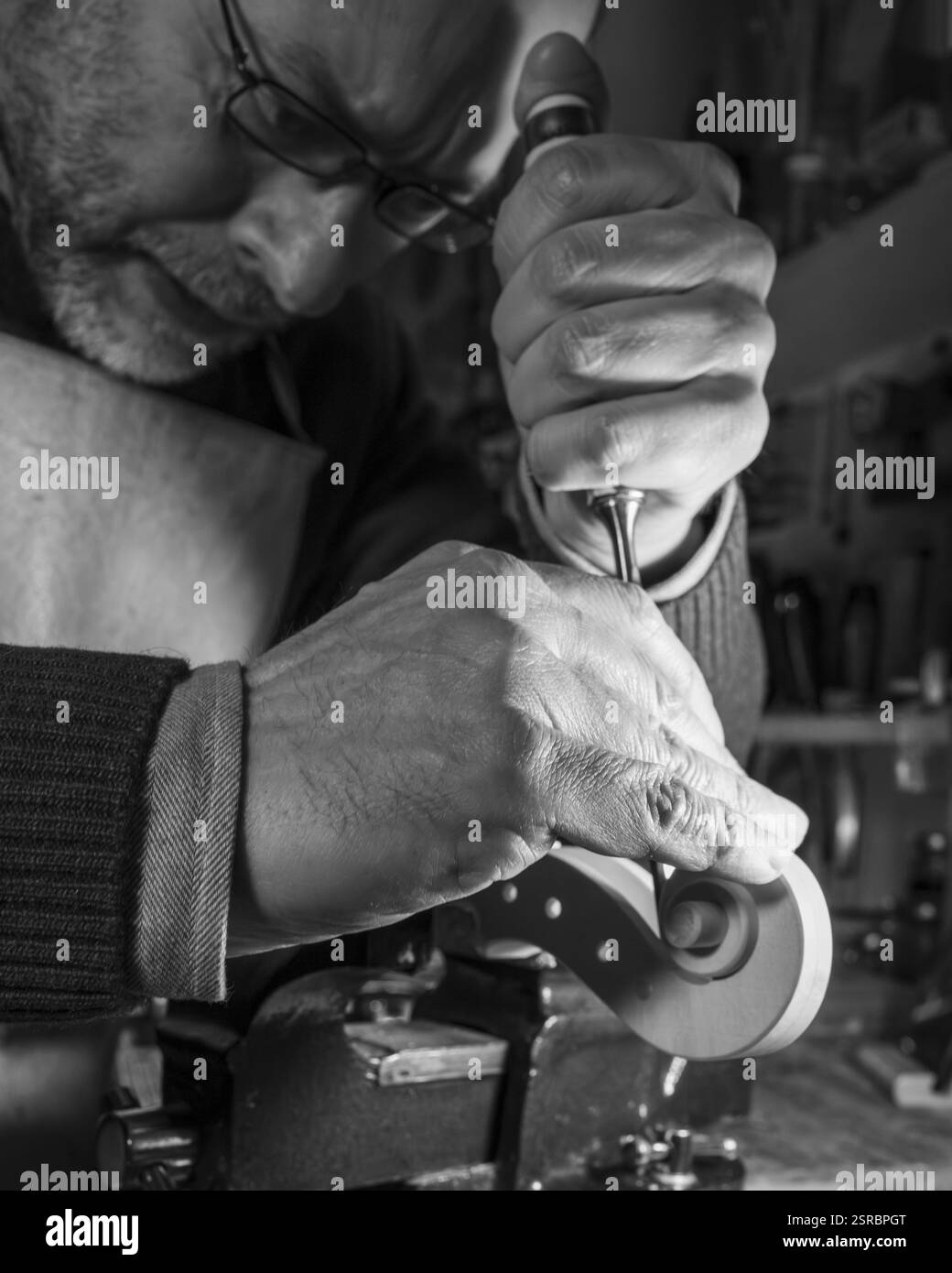 Craftsman fixing Black and White Stock Photos & Images - Alamy