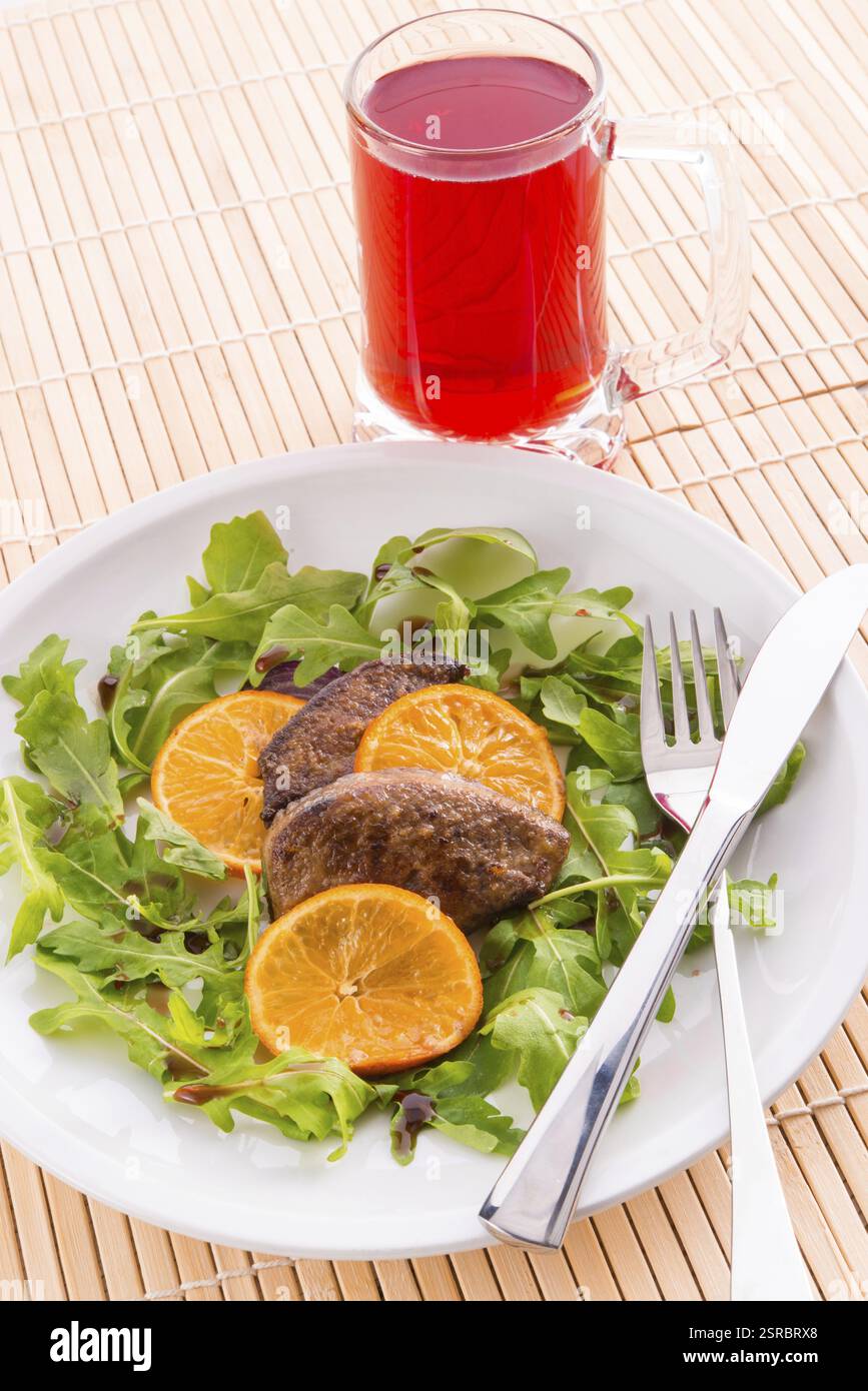 Liver with onion-orange sauce Stock Photo - Alamy