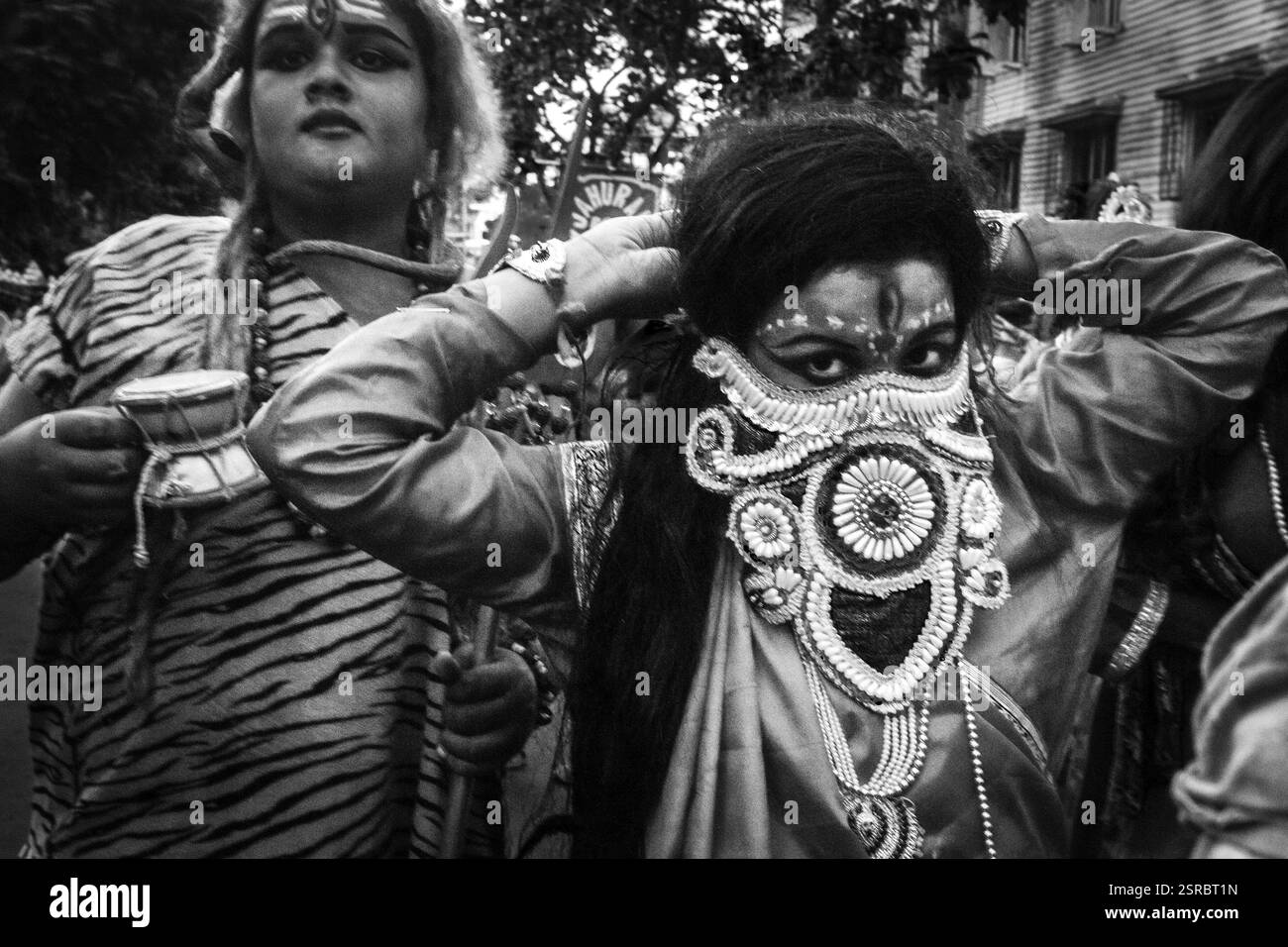 Men in fancy dress in Charak Festival parade, Kolkata, West Bengal ...