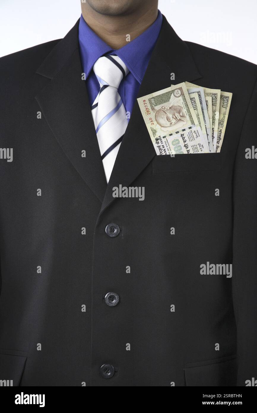 Executive without face keep Rs.500 notes in upper pocket of coat MR ...