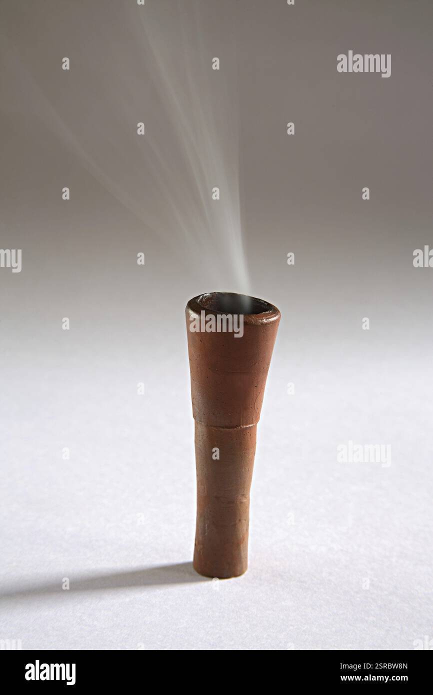 Concept, clay cilam contains fire and tobacco for smoke equipment on ...