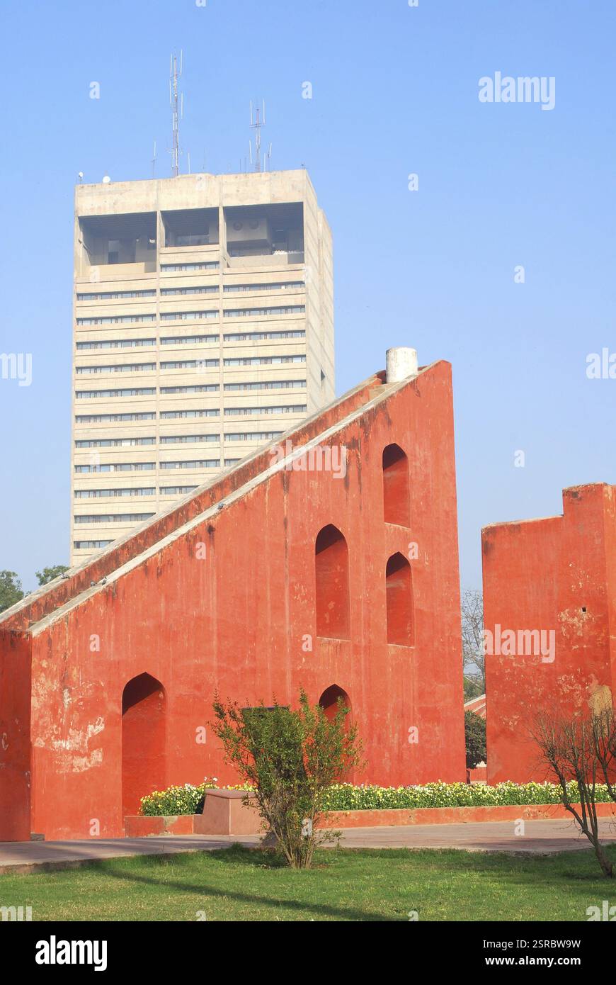 Red structure with steps of Jantar Mantar residential building in ...