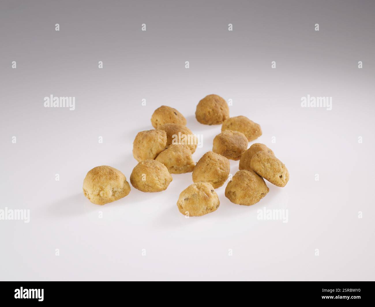 Snacks, Jeera butter jeera on white background Stock Photo - Alamy