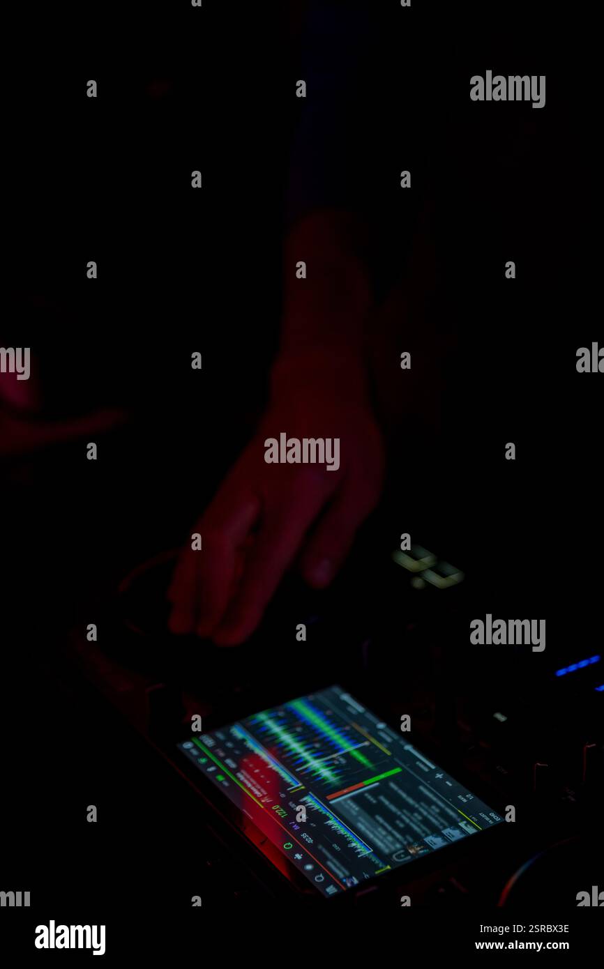 An extraordinary DJ performance with advanced equipment and vibrant ...