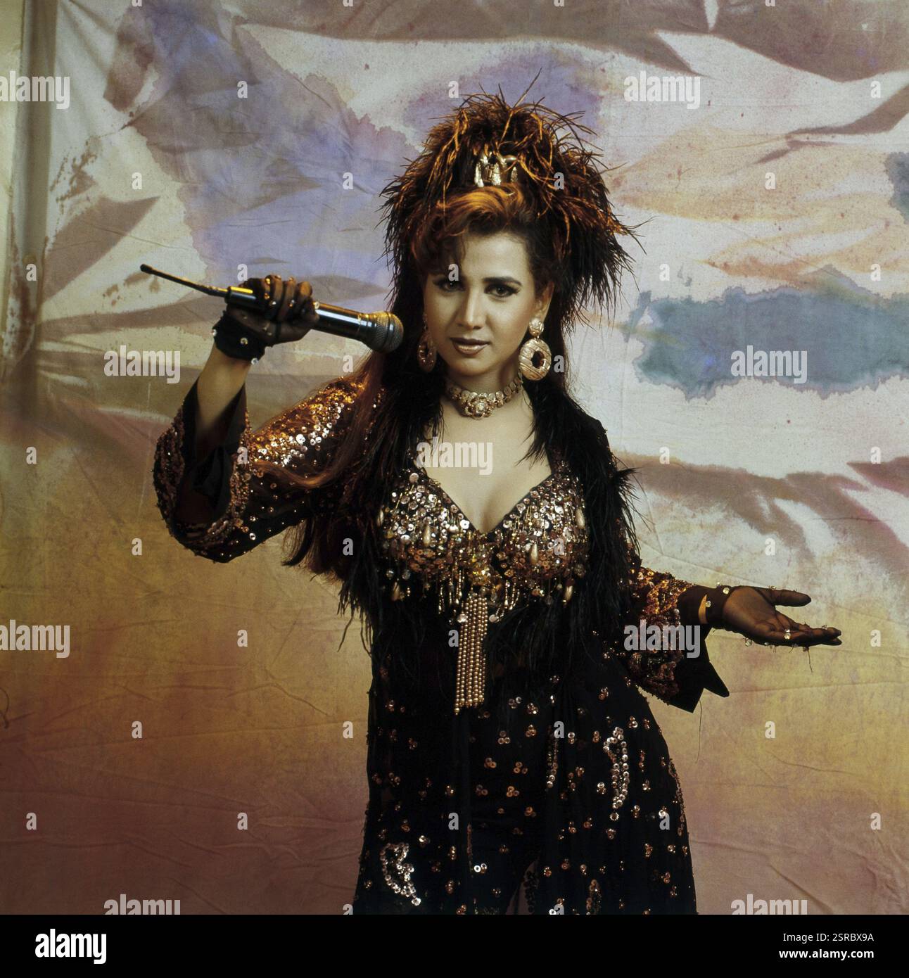 Not celebrity woman holding microphone hi-res stock photography and ...