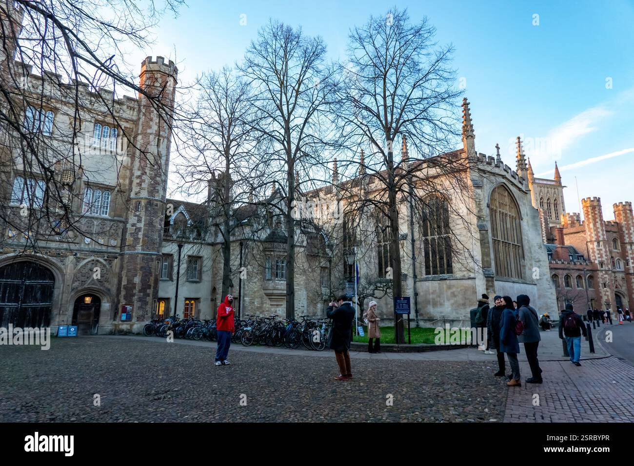 Tourists explore the historic architecture in the vibrant courtyard of ...