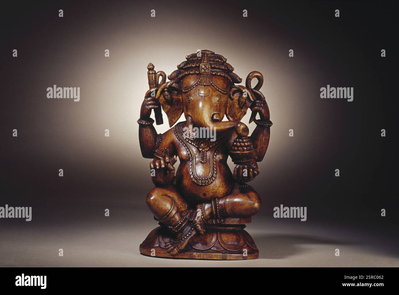 Statue of Stone model God Ganesh ganpati made by Teakwood Stock Photo ...