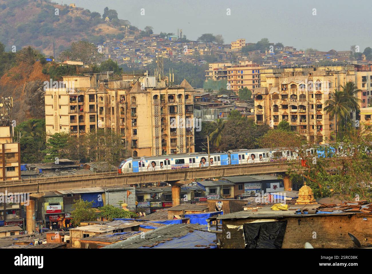 Metro train near Asalpha railway station, Mumbai, Maharashtra, India ...