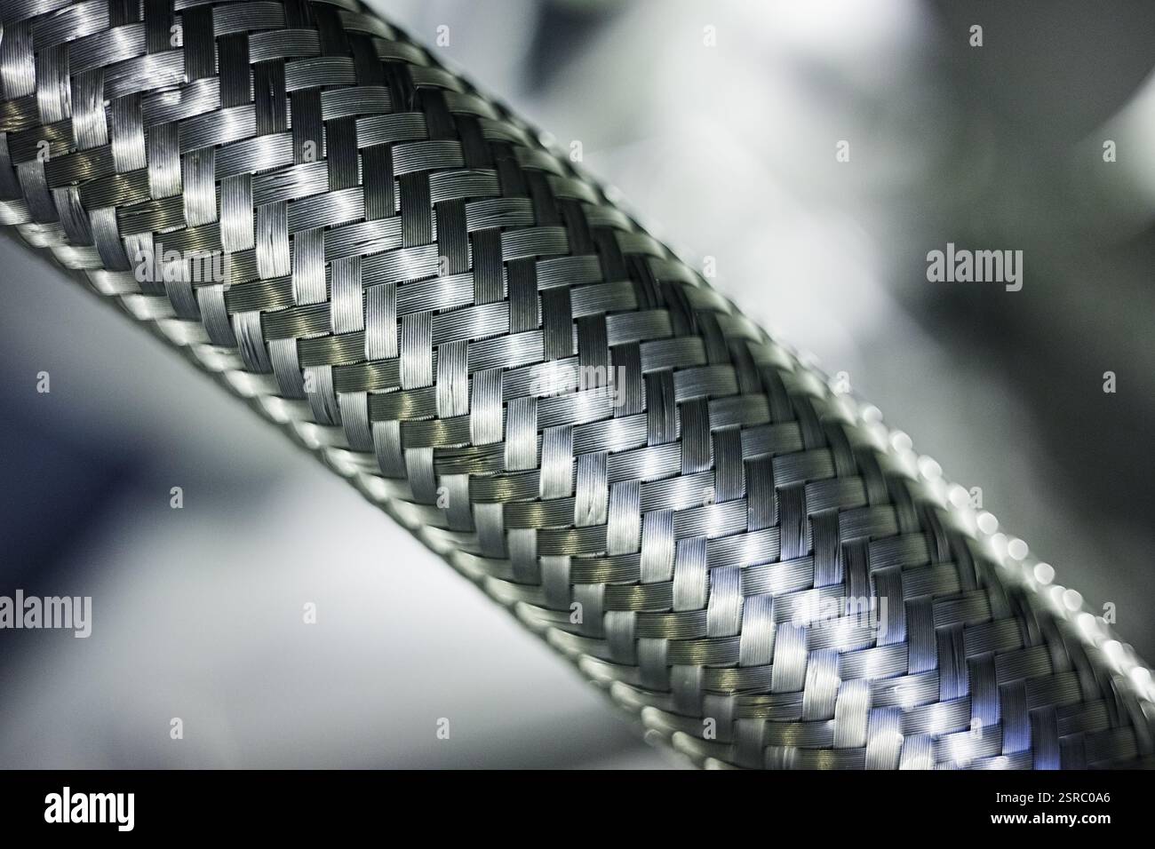 Reinforced hose with steel wire texture hydroline Stock Photo - Alamy