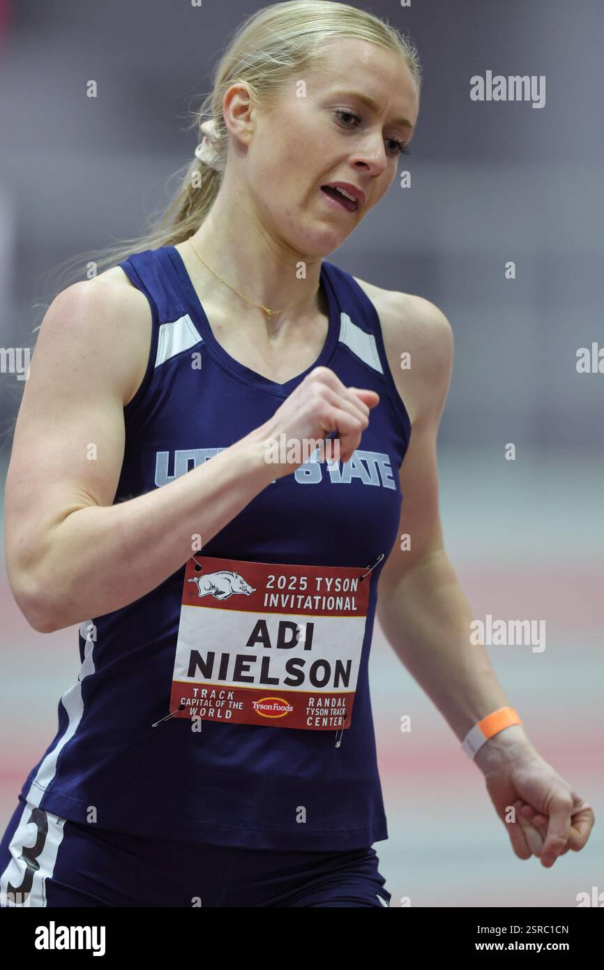 February 14, 2025: Utah State runner Adi Nielson comes around the final ...
