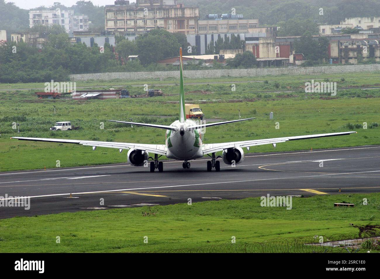 Commercial plane on runway ready for take off at Sahar airport or ...