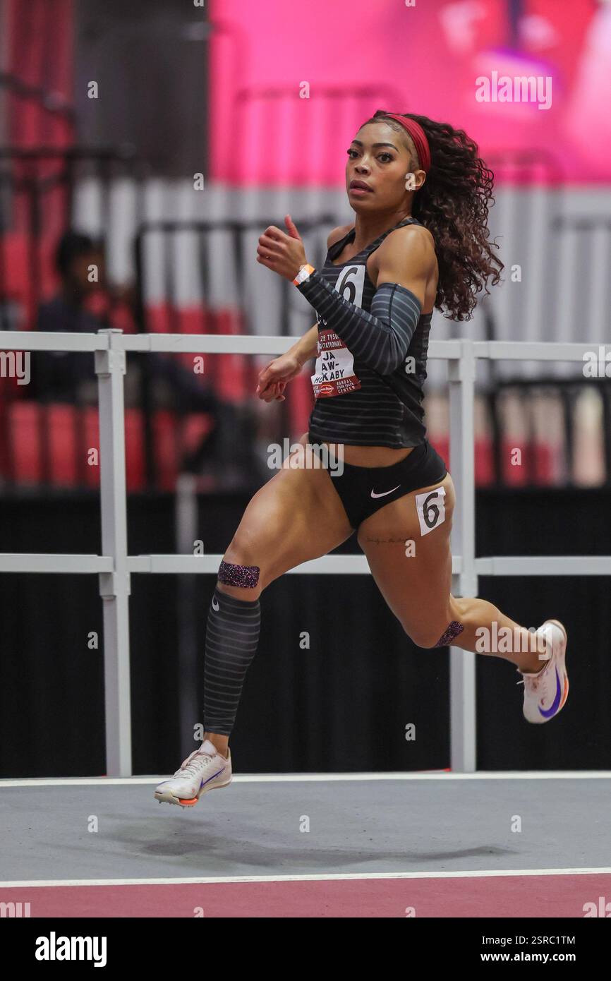 February 14, 2025: UCF runner Deja Shaw-Huckaby comes around the track ...