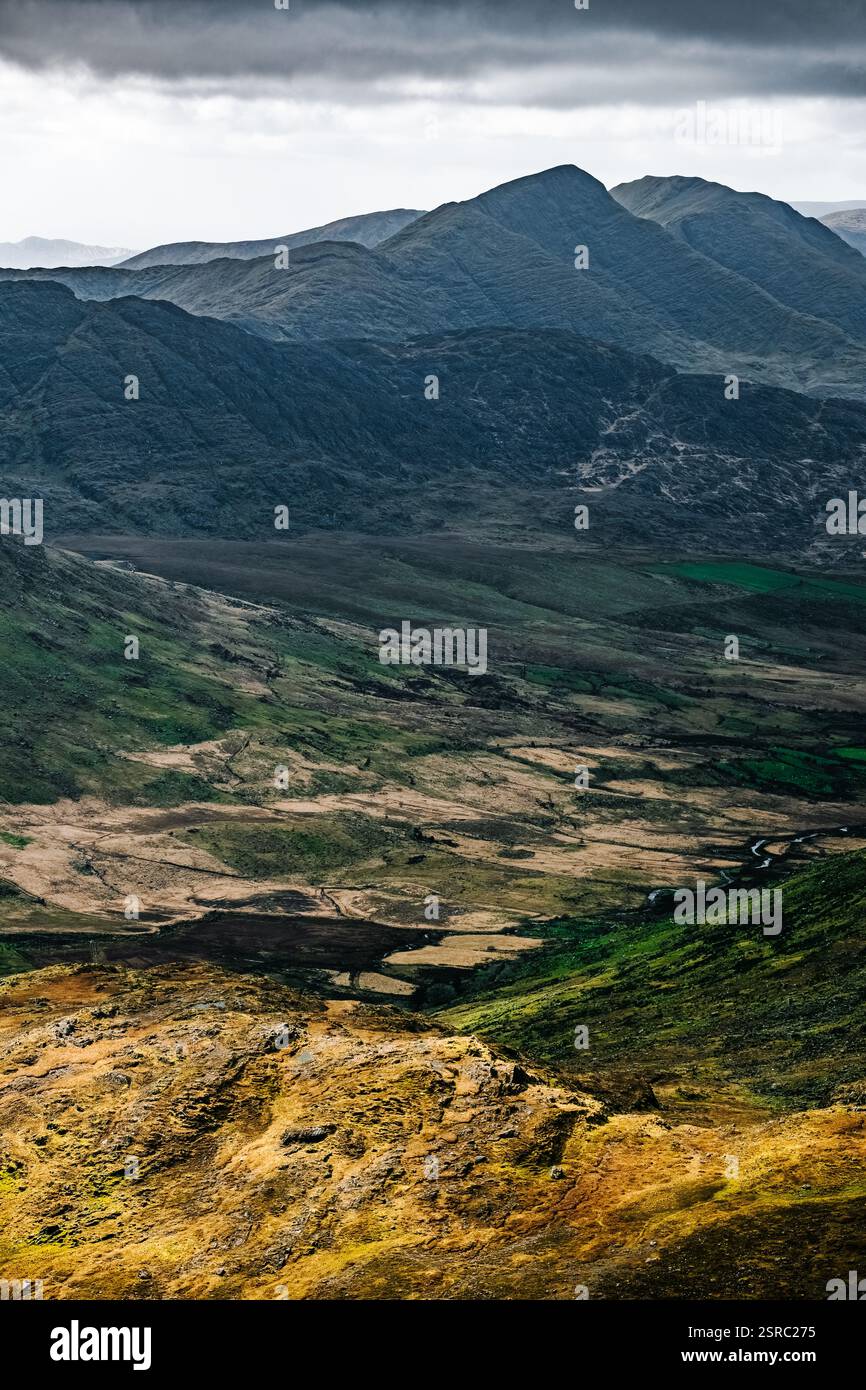 Stunning view of verdant valleys and rugged mountains in a remote ...