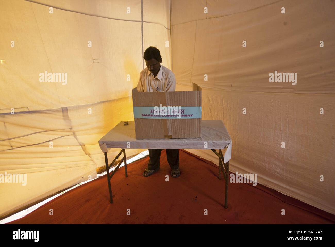Election officer setting up the electronic voting machine, mumbai ...