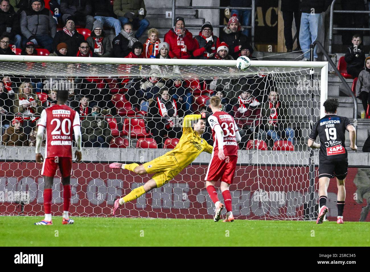 Antwerp, Belgium. 15th Feb, 2025. Antwerp's goalkeeper Senne Lammens is beaten by 10 Kortrijk's ...