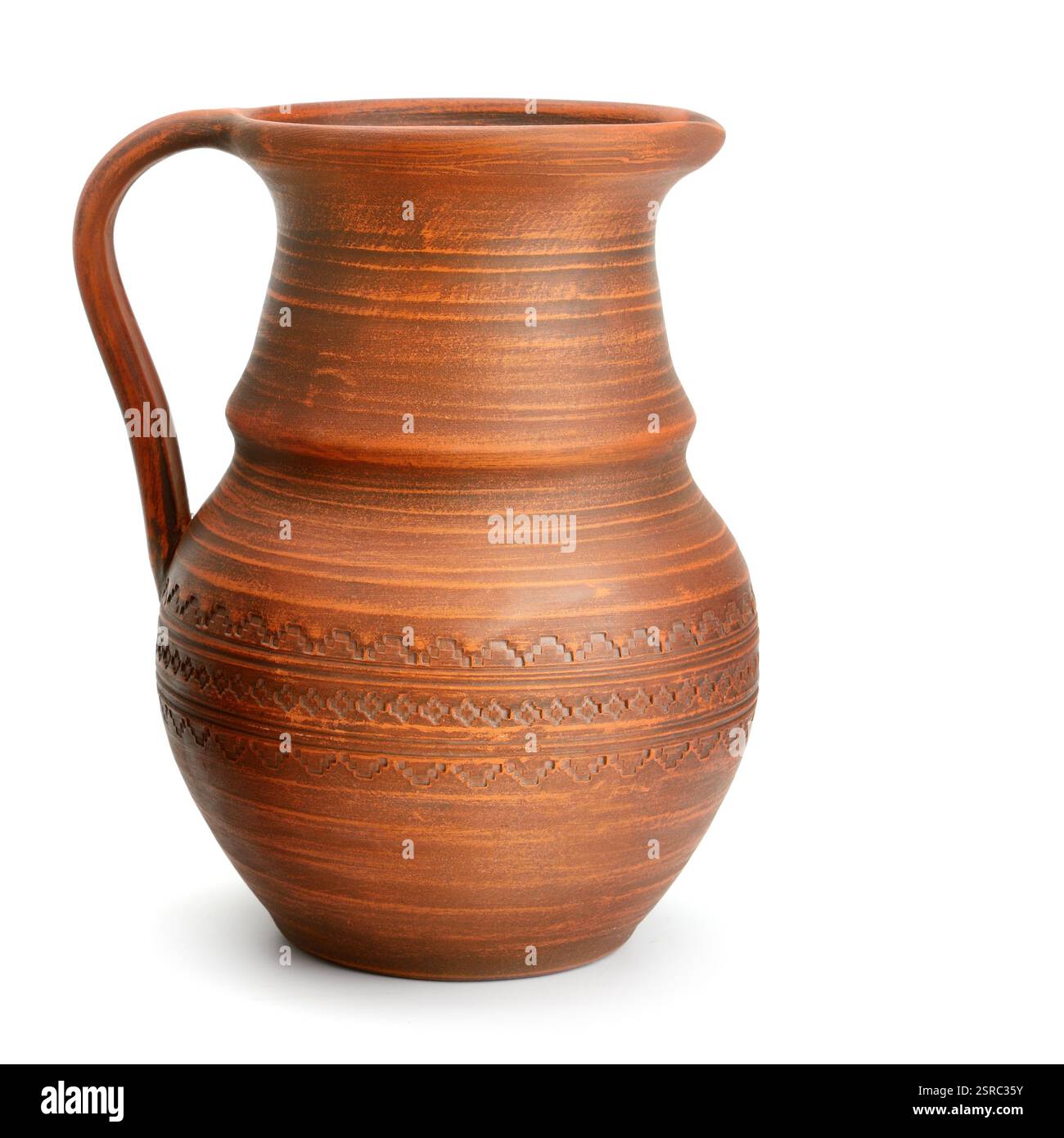 Clay jug handmade isolated on white background Stock Photo - Alamy