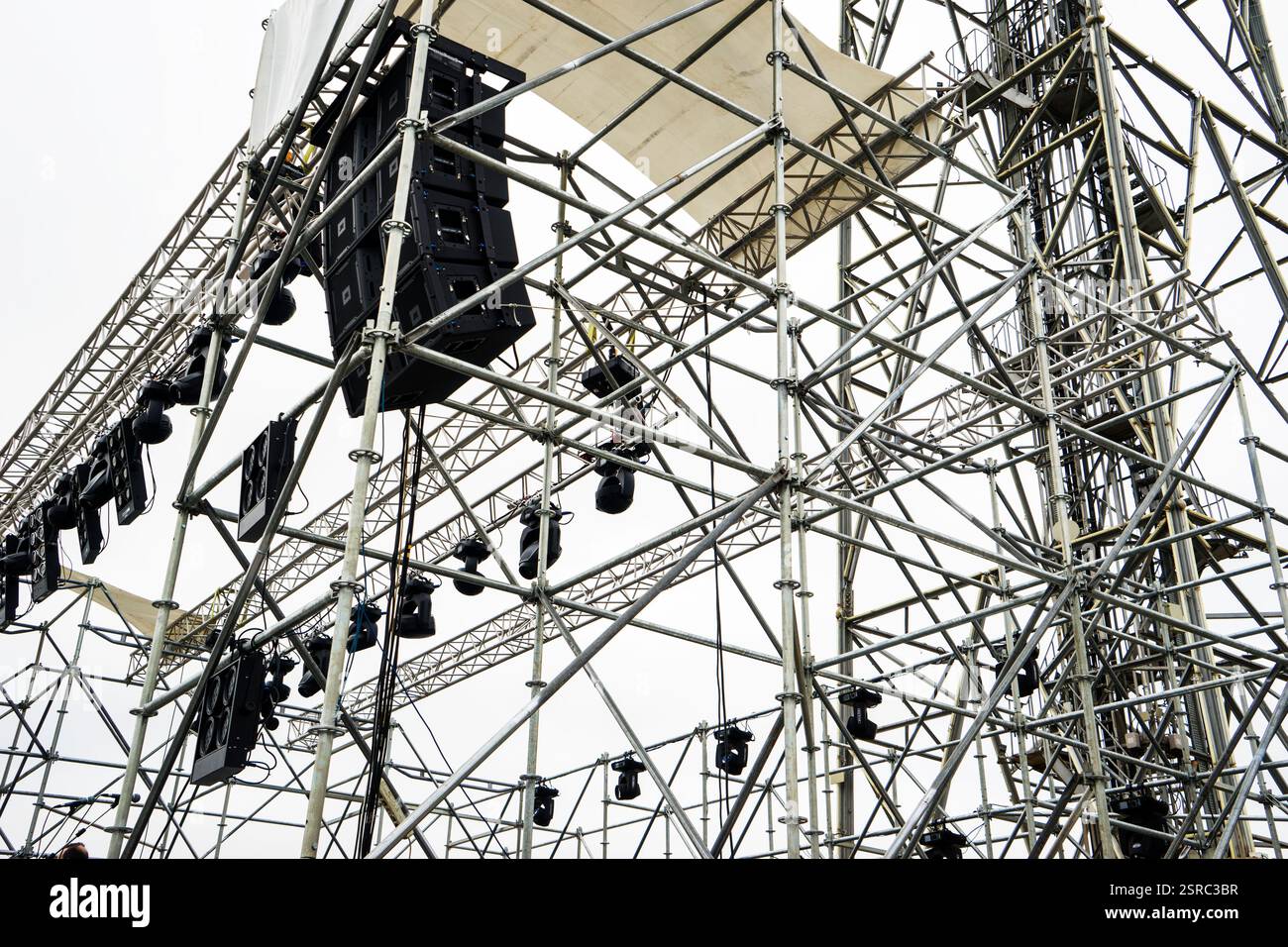 Speaker and spotlight mounted over a large stage in city park Stock ...