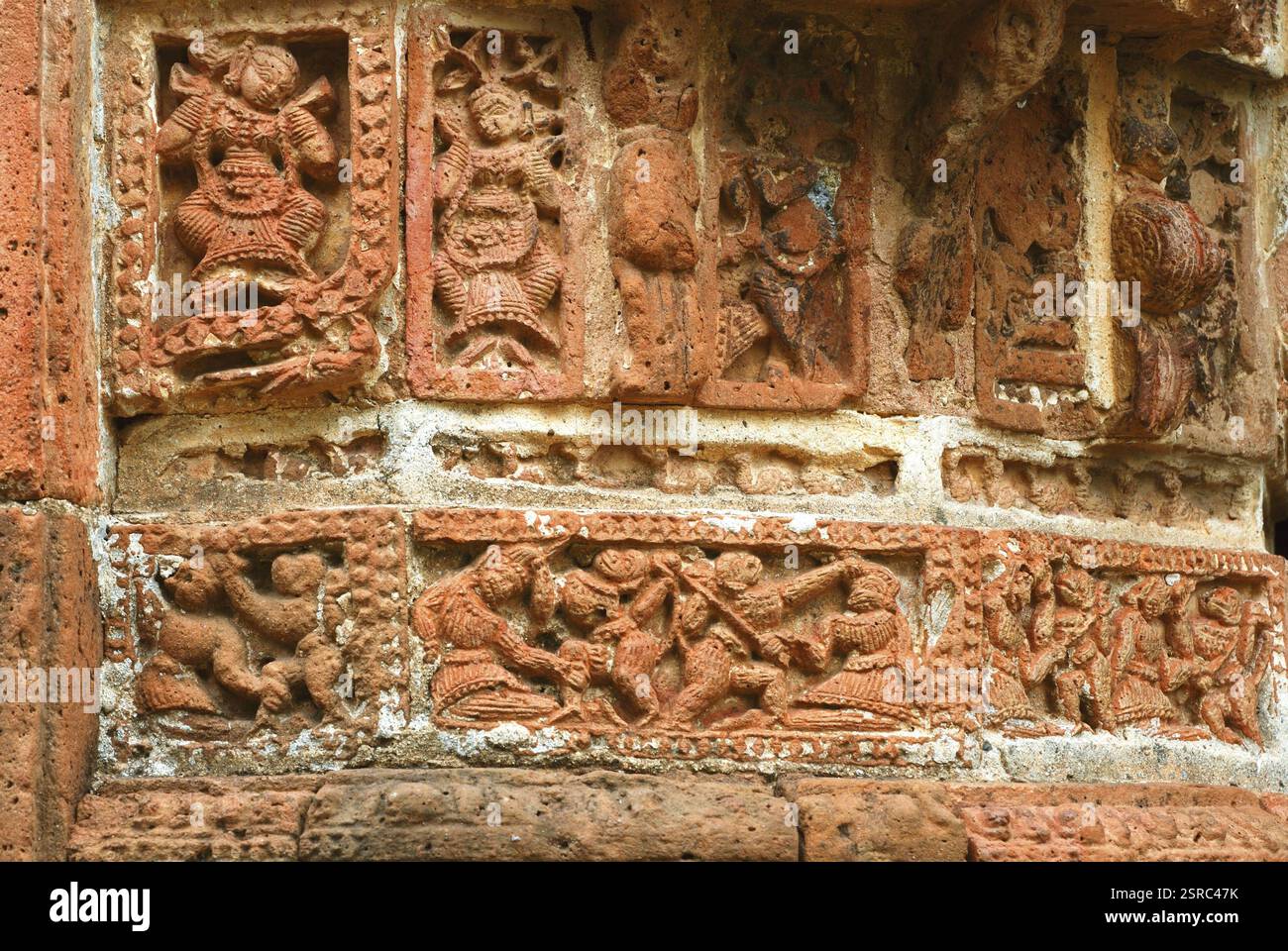 Terracotta artworks of Jor Bangla temple panels made of burnt clay shows figures and designs in ...