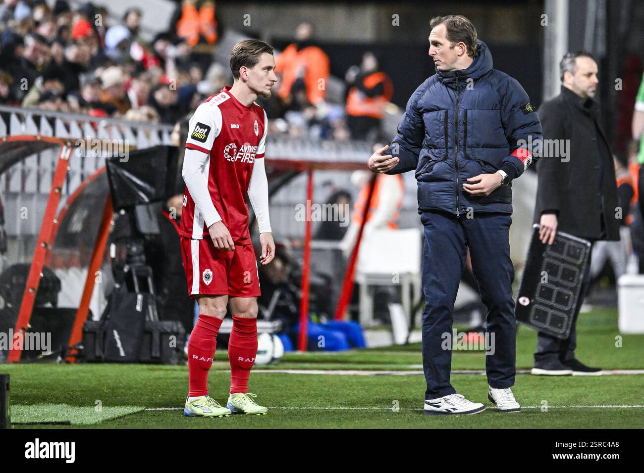 Antwerp, Belgium. 15th Feb, 2025. Antwerp's Dennis Praet and Antwerp's head coach Jonas De Roeck ...