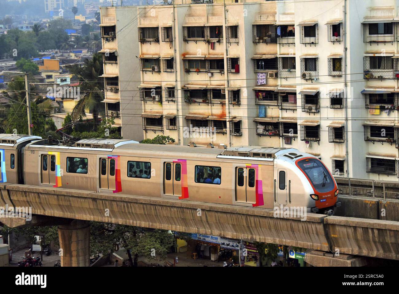 Metro train near Asalpha railway station, Mumbai, Maharashtra, India ...