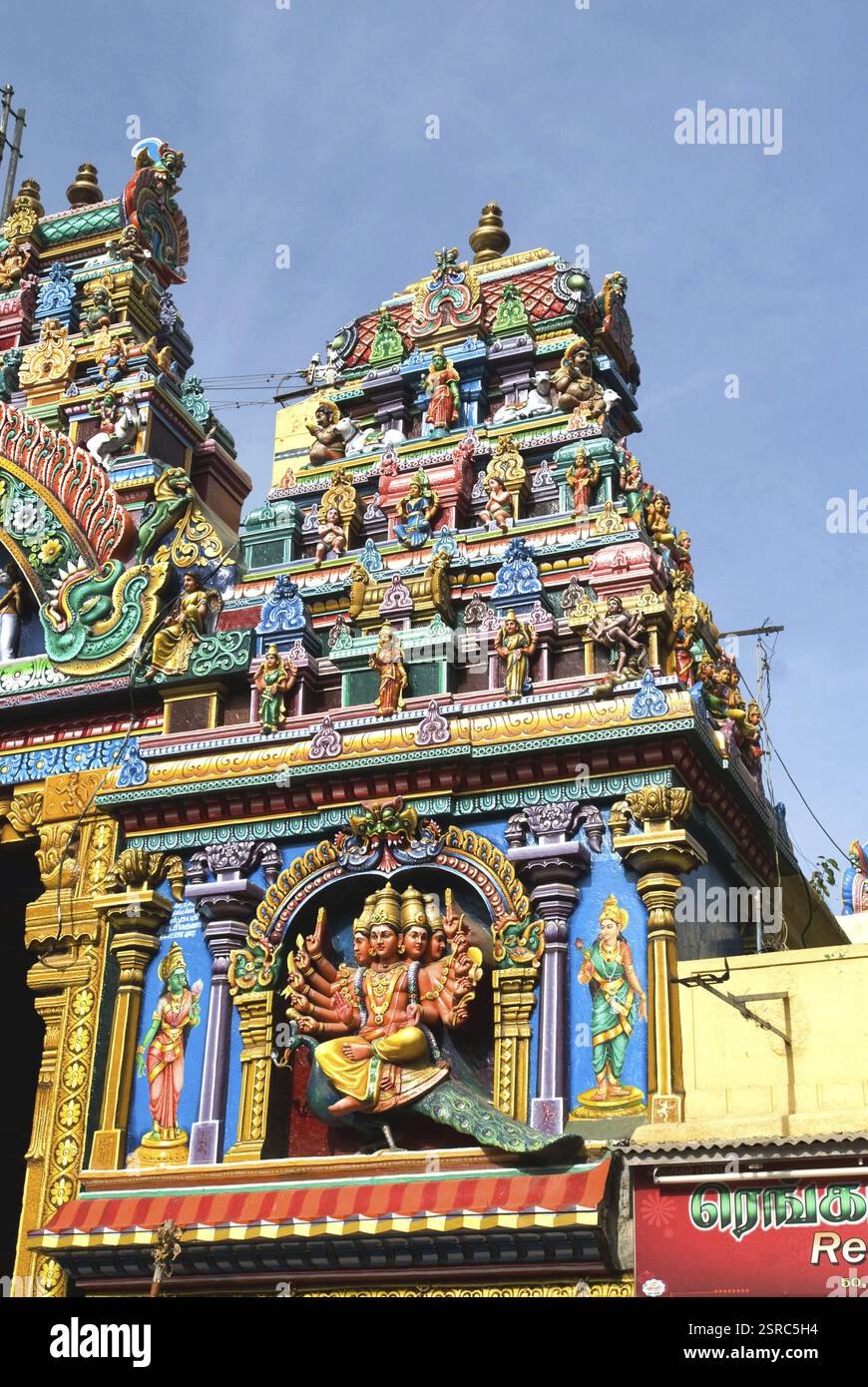 Lord shanmuga on peacock in stucco figures on gopuram of meenakshi ...