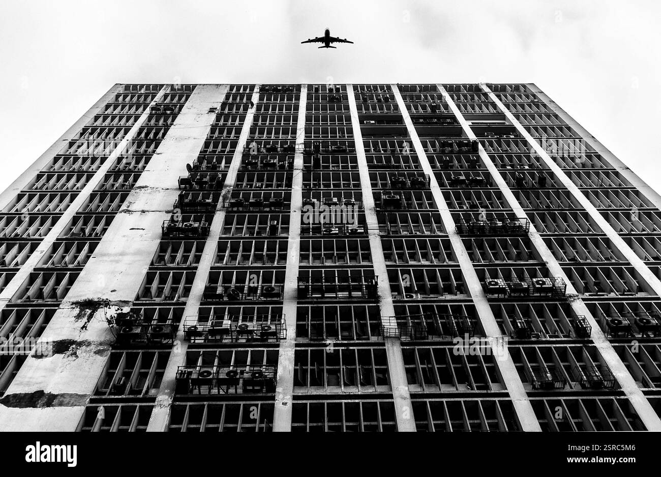 Airplane passing on high rise, kolkata, west Bengal, India, Asia Stock ...
