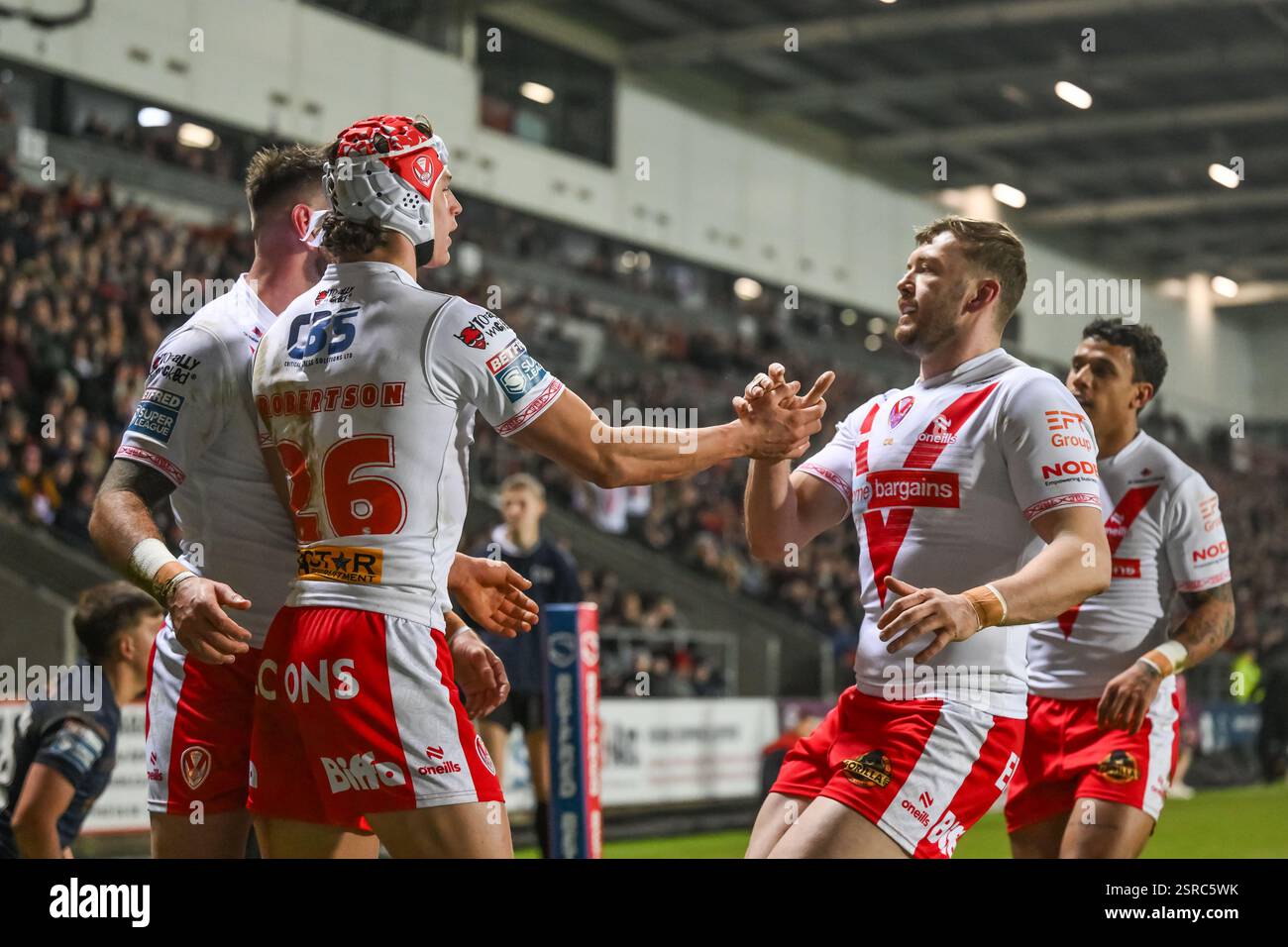 Harry Robertson of St. Helens celebrates his try during the Betfred ...