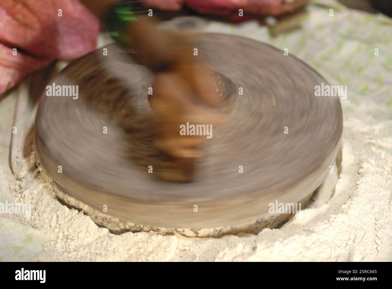 Traditional method of grinding flour, hand mill, Konkan, Maharashtra ...
