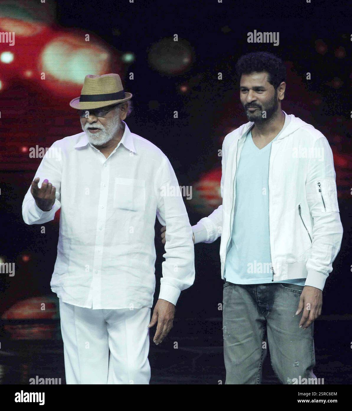 Bollywood actor Prabhu Deva along father and choreographer Mugur Sundar on the sets of dance ...