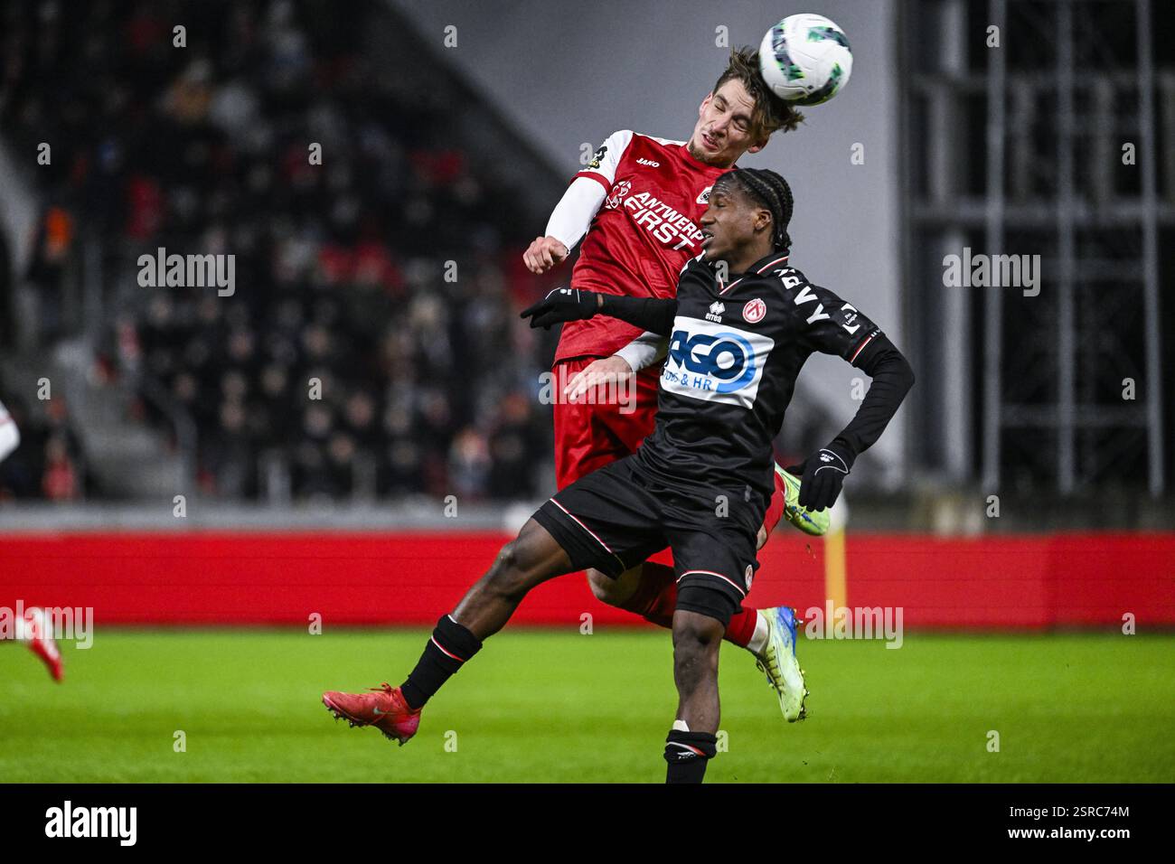 Antwerp, Belgium. 15th Feb, 2025. Antwerp's Dennis Praet and Kortrijk's Karim Dermane pictured ...