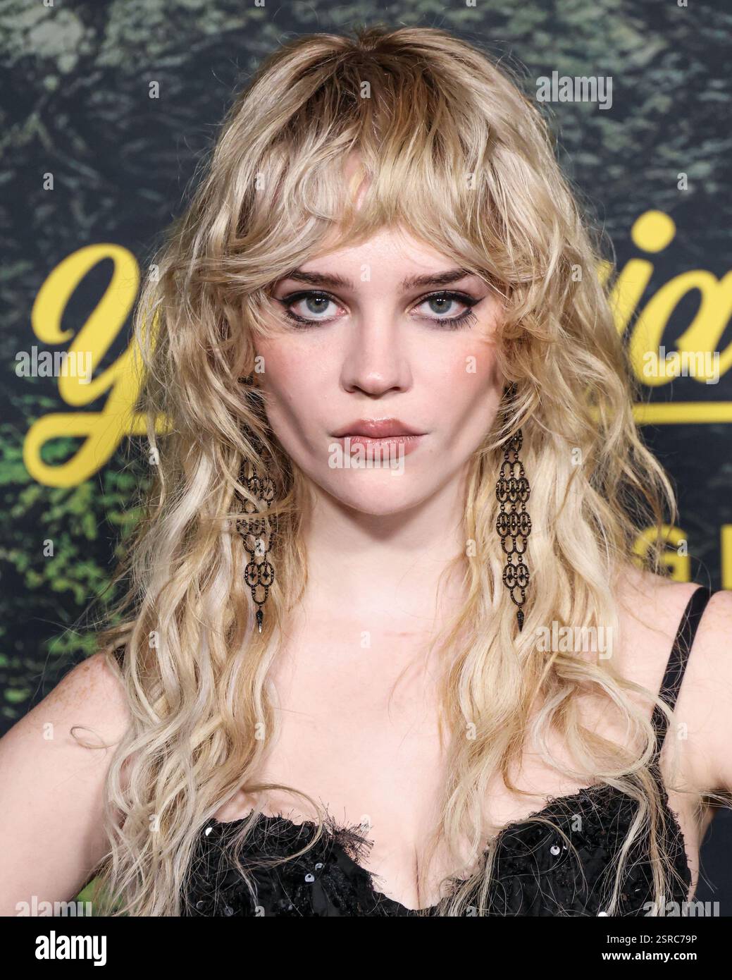 LOS ANGELES, CALIFORNIA, USA - FEBRUARY 13: Sophie Thatcher wearing a ...