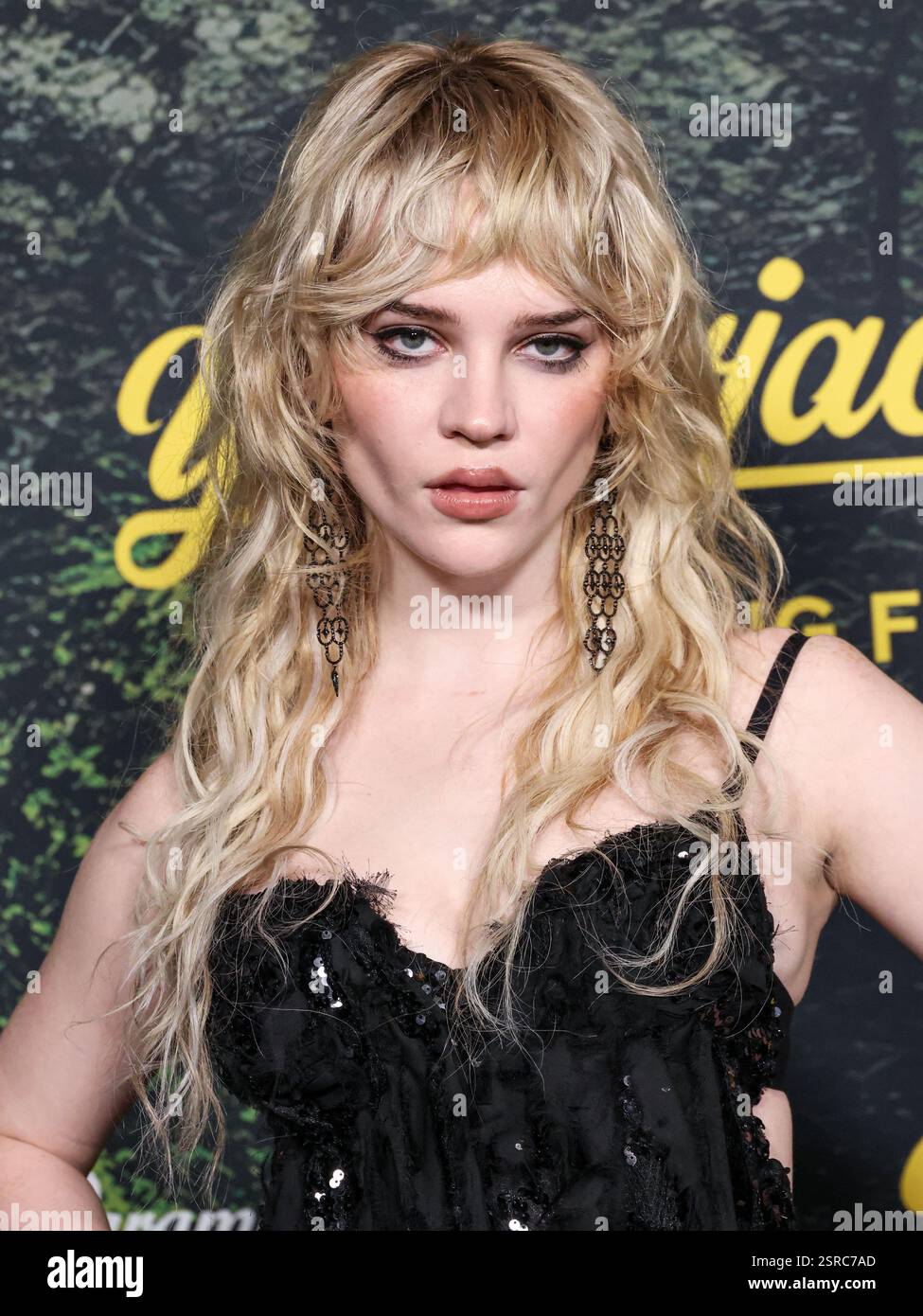 LOS ANGELES, CALIFORNIA, USA - FEBRUARY 13: Sophie Thatcher wearing a ...