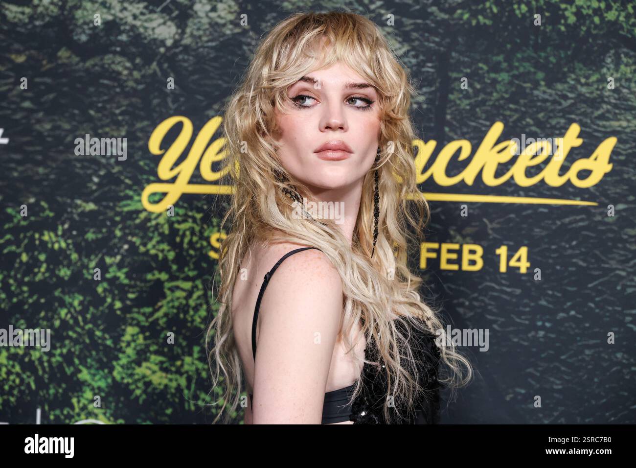 LOS ANGELES, CALIFORNIA, USA - FEBRUARY 13: Sophie Thatcher wearing a ...