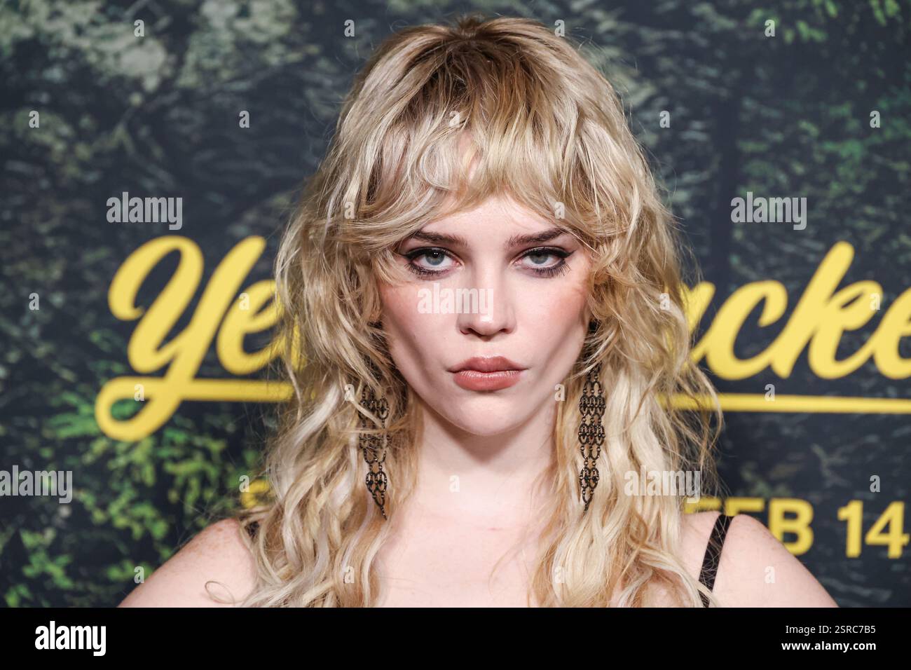 LOS ANGELES, CALIFORNIA, USA - FEBRUARY 13: Sophie Thatcher wearing a ...