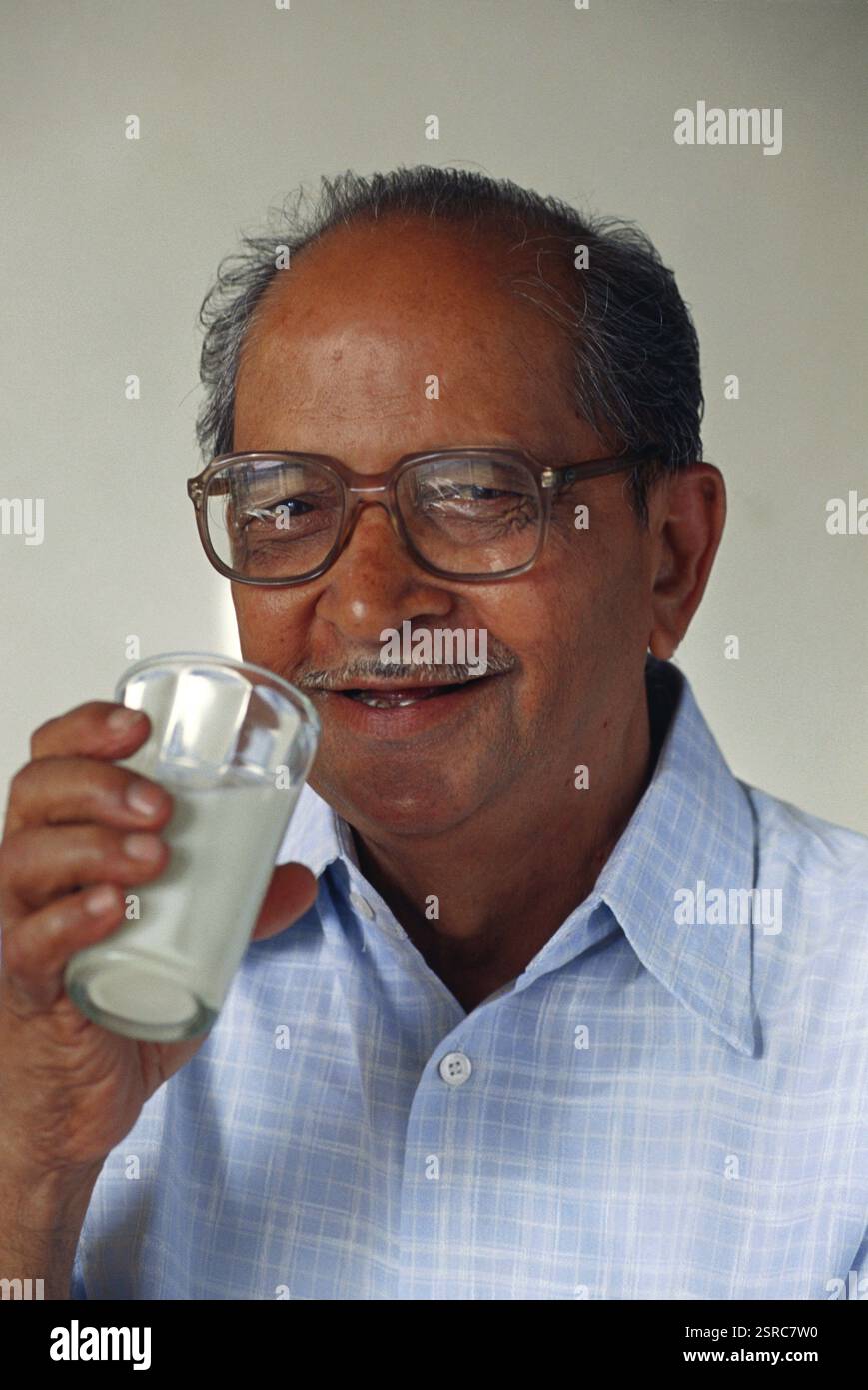 Old man drinking milk MR#323 Stock Photo - Alamy