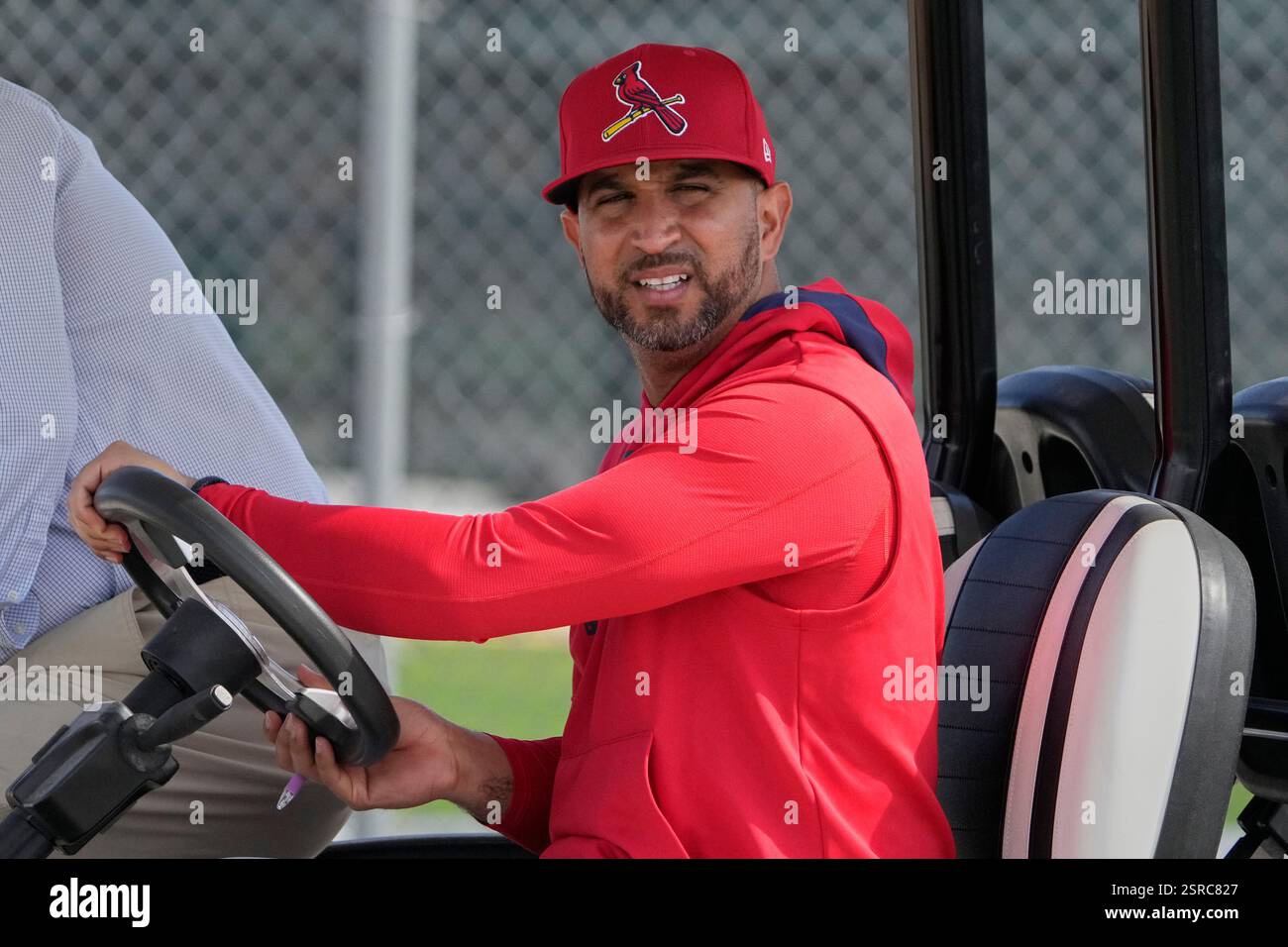 St. Louis Cardinals manager Oliver Marmol watches from a golf cart ...