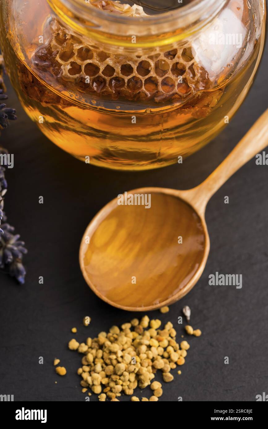 Lavender honey with bee pollen and honey comb Stock Photo - Alamy