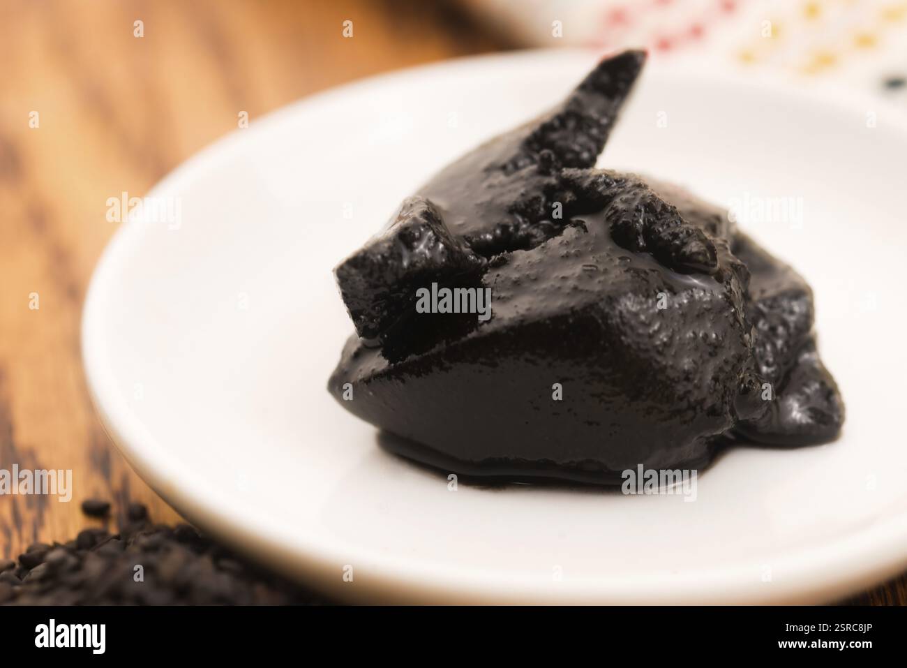 Black sesame paste Stock Photo - Alamy