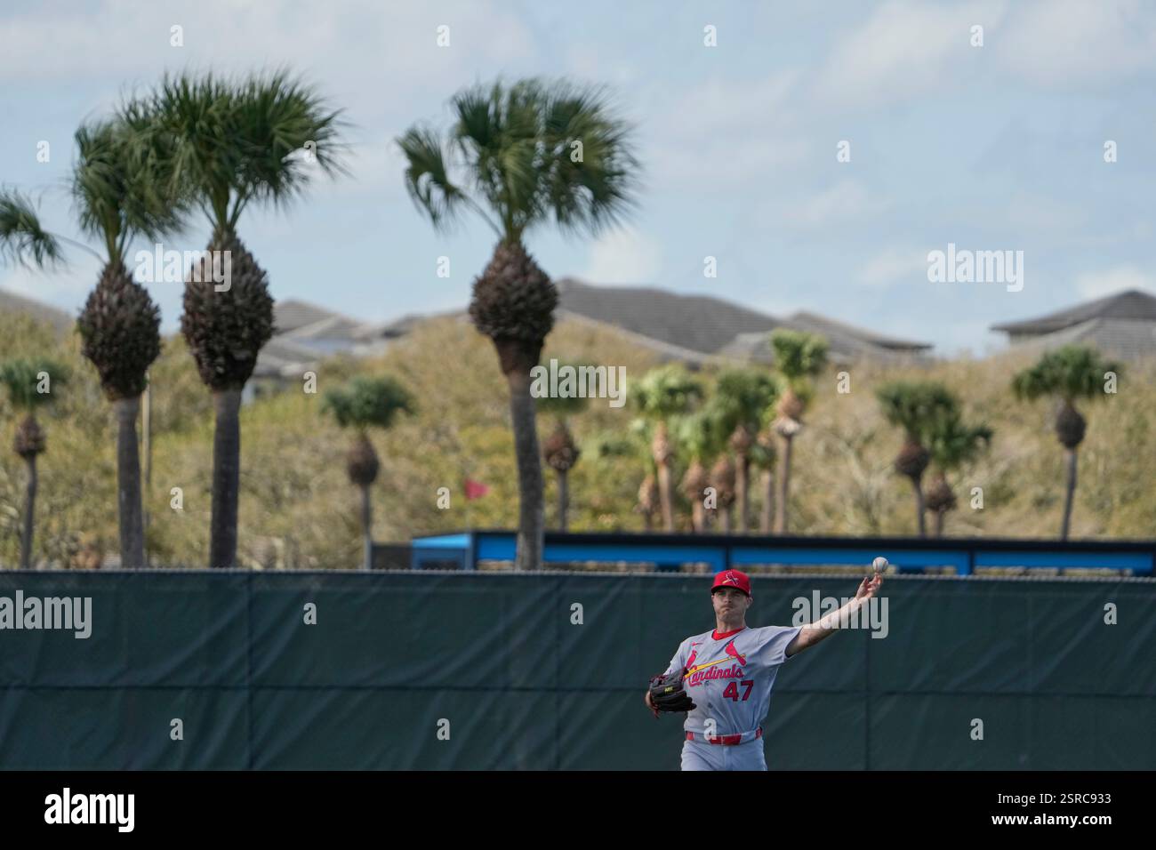 St. Louis Cardinals pitcher John King throws during a spring training ...