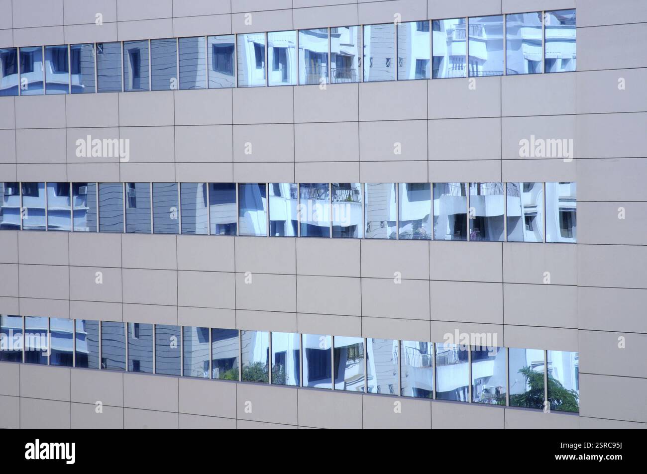 Reflection of buildings on glass windows of IT building, Pune ...