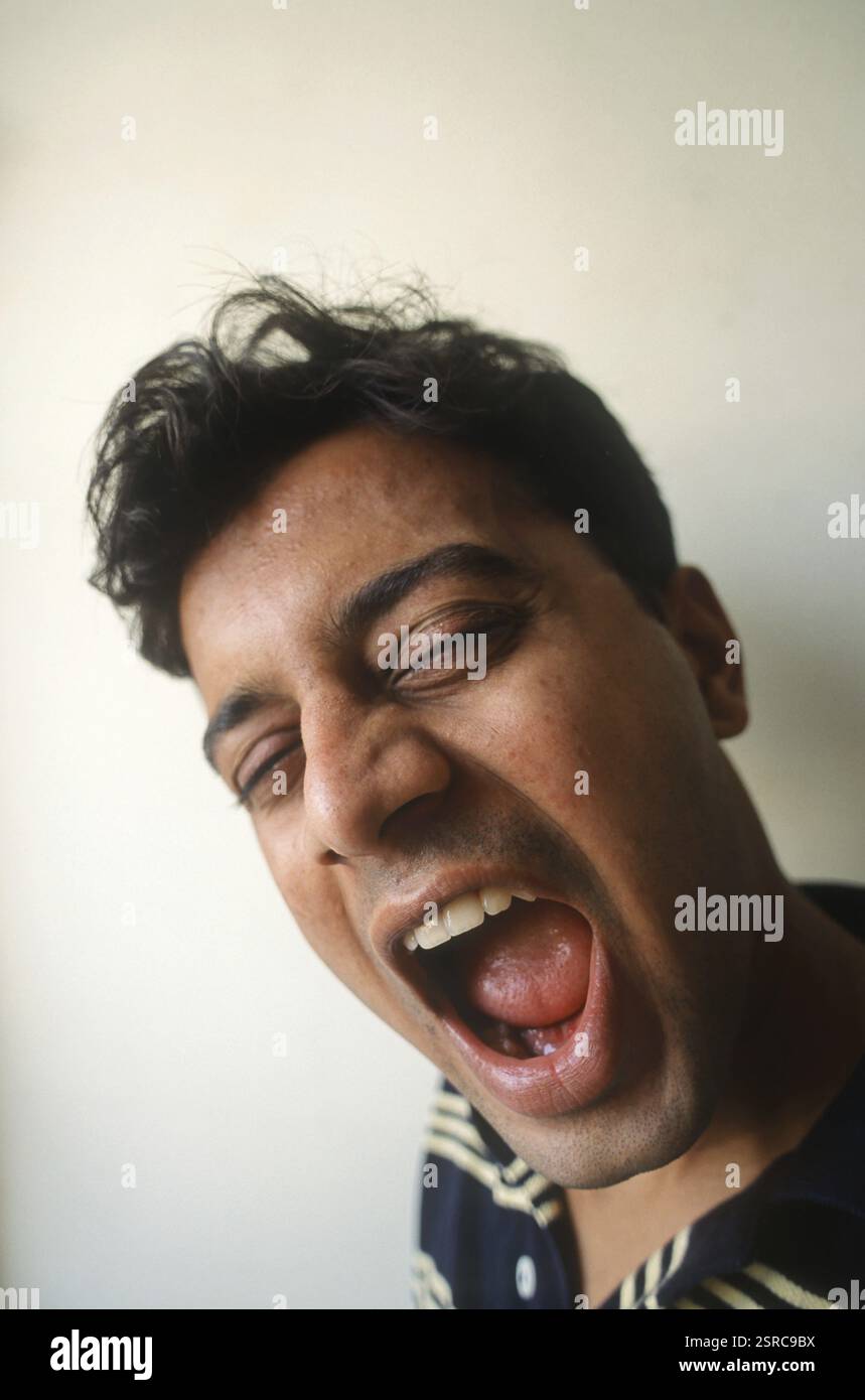 Indian young man screams hi-res stock photography and images - Alamy