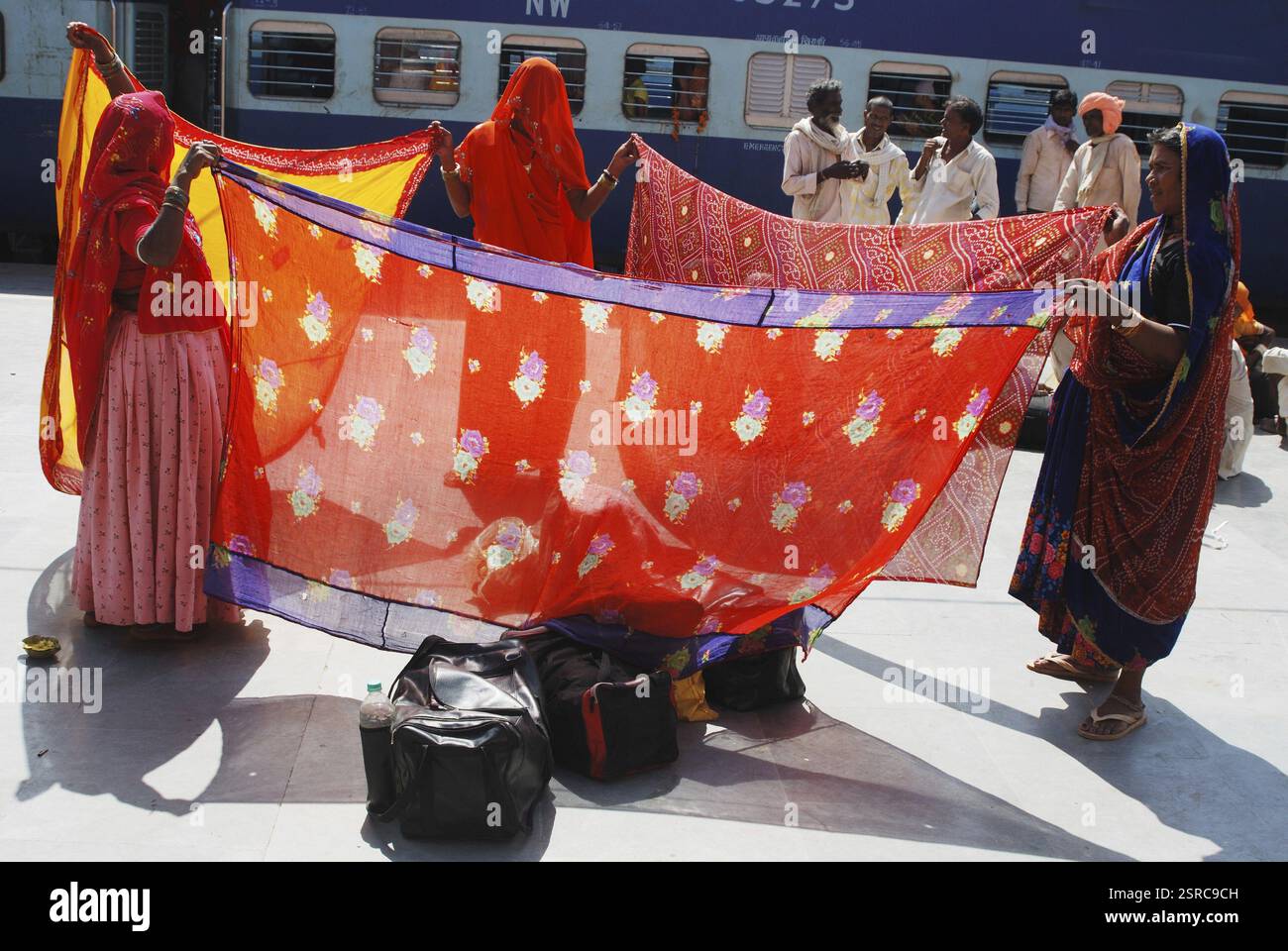 Ladies drying their clothes on railway platform, Jodhpur, Rajasthan ...