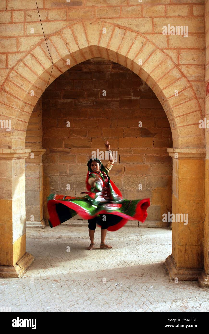 Folk dancer dancing in porch of Gadisar Gadsisar lake, Jaisalmer ...